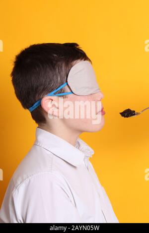 Blindfold taste test, different foodstuff lined up ready to perform ...