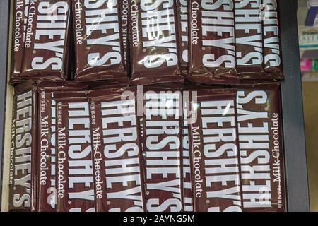 Hershey's products are on display as shoppers walk through a new ...
