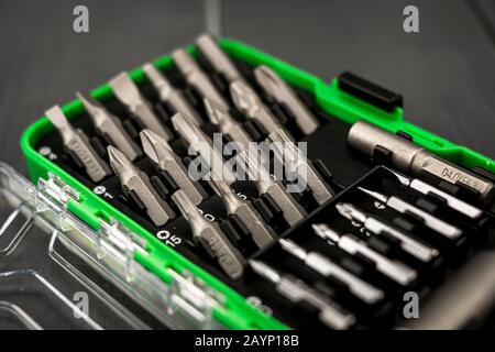 Plastic toolbox with interchangeable screwdriver tips of different ...