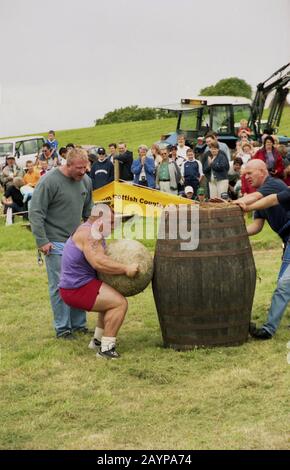 Strong man lifting heavy stone Lebanon Middle East Stock Photo - Alamy