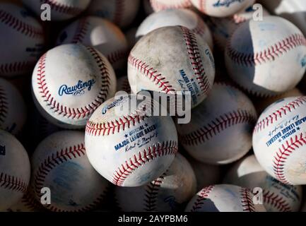 Bucket of baseballs Stock Photo - Alamy