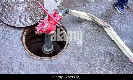 typical Russian red fire hydrant underground Stock Photo - Alamy