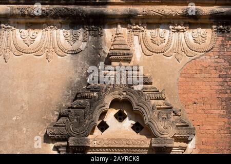 Detail of stucco ornamentation on the Gubyaukgyi temple, is a Buddhist ...