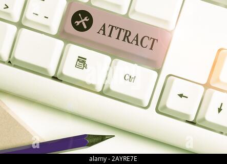 Conceptual hand writing showing Attract. Concept meaning to draw by a ...