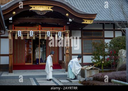 Shinto priests doing a ceremony in the morning at the Fushimi Inari ...