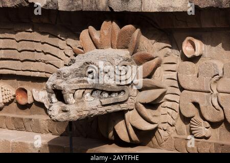 Aztec god Quetzalcoatl, the Feathered Serpent. The serpent's coils are ...