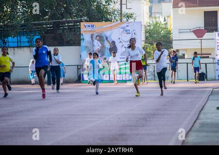 Girls running in 100 meter race compition Stock Photo - Alamy
