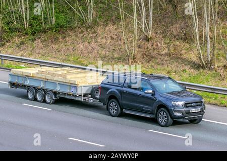 Three-wheeled vehicles on the road, called Tatlong-wiler motorized ...