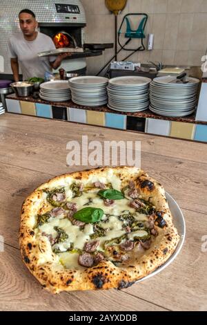 Traditional Neapolitan pizza sausage and friarielli, Naples, Campania ...