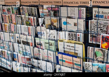 Magazines on rack of newsagent, London England UK Stock Photo - Alamy