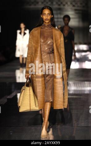 A model on the catwalk at the Burberry show in Perks Field, Kensington ...