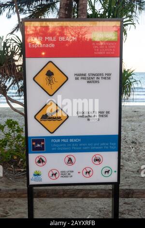 Sign warning of crocodiles and marine stingers at Trinity Beach, Cairns ...