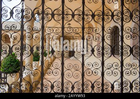 Wrought-iron gate, courtyard in centre of Milan, Italy Stock Photo - Alamy