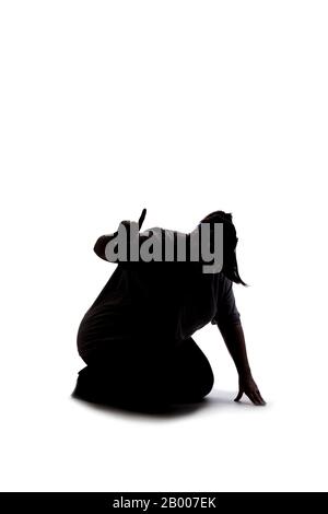 A crouching plus size woman Stock Photo - Alamy
