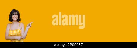 Photo of positive glad girl toothy smile hands hold bags packages ...