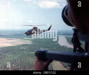 Vietnam: AH-1G Cobra gunship helicopter over southern Vietnam, 1969 ...