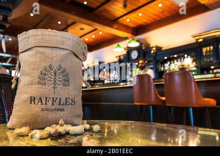Inside the Long Bar of the Raffles Hotel in Singapore. Home of the ...