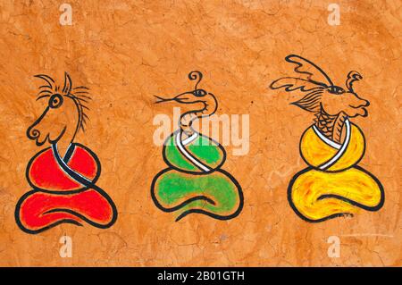 China: Dongba (Naxi) pictographic script adorns a house in the Old Town ...