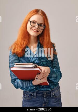Red-haired college girl Stock Photo - Alamy