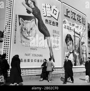 Pedestrians walk past the American clothing company brand, Levi´s ...