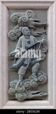 Malaysia / China: Carving of the god Nezha, depicting his role in the ...