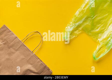 the paper cotton eco versus plastic package flat lay. environmental ...