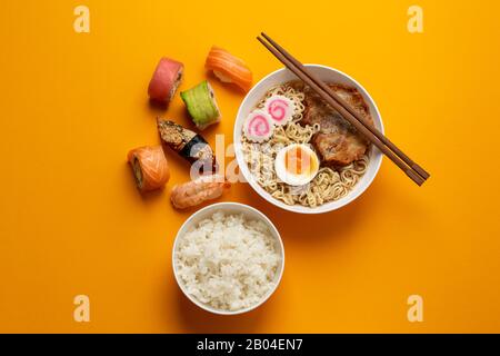 Japanese dishes set: Soup ramen, boiled rice, sushi Stock Photo - Alamy