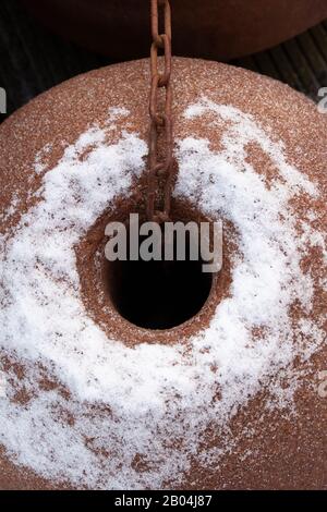 Old rusty metal ships buoy and chain with snow Stock Photo - Alamy