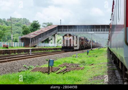 Ro-Ro (Roll On Roll Off) train carrying trucks crossing at Sawantwadi ...