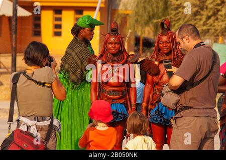 Himba Tribe Woman With Ornaments On The Neck, In The Village Of Himba ...