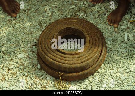 SOLOMON ISLANDS, NENDO ISLAND, NATIVE WITH TRADITIONAL FEATHER MONEY ...