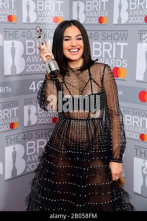 Mabel with the Brit Award for Best British Female in the press room at ...