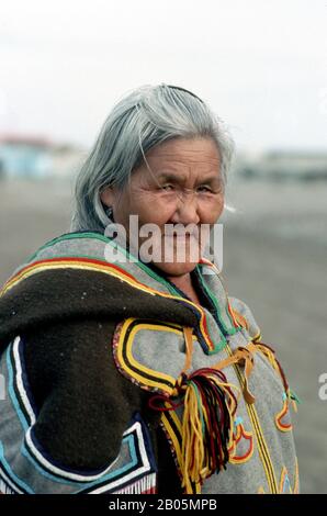 Elderly Inuit woman in traditional skin clothing. Grise Fjord, Nunavut ...