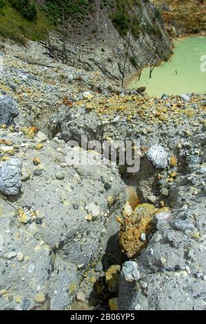 Sulphureous Crater lakes Wawo muda volcano in the white clouds in ...