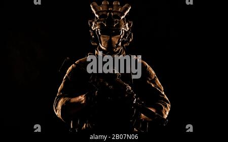 Special operations forces soldier equipped with night vision and an ...