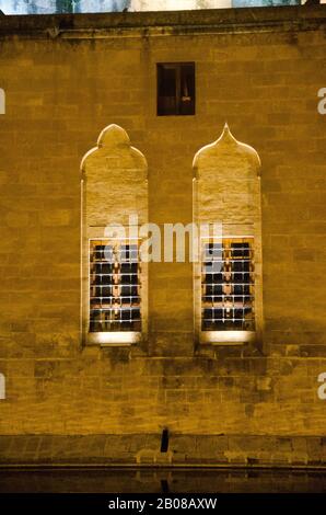 Modern house with lighted windows Stock Photo - Alamy