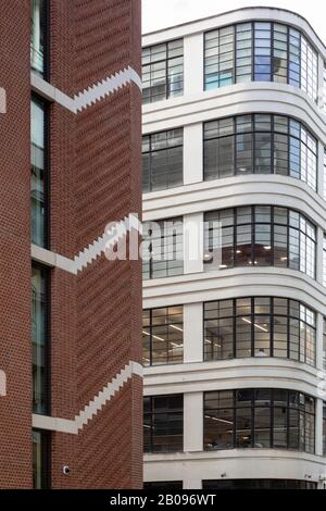 Detail view of curved brick corner. UCLH Eye Hospital, London, United ...
