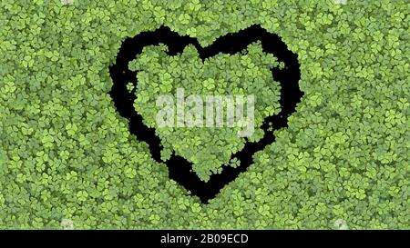 Green clover covering the screen in the shape of a heart on black ...