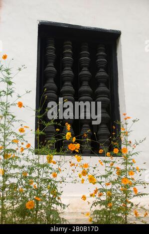 Laos, Luang Prabang, Vat Aham, Buddha protected by the Naga Stock Photo ...