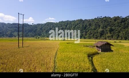 A landscape with the hill station of Haflong in the foreground and the ...