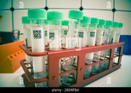 Closed test tube with barcode QR biological sample Stock Photo - Alamy