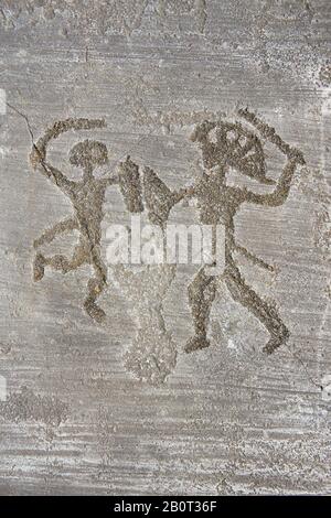 Petroglyph, rock carving, of two feet outlines. Carved by the ancient ...