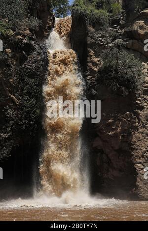 View of Waterfall, River draining into lake, Makalia Waterfall, Lake ...