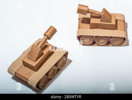 two toy tanks made by children from corrugated cardboard. toy cardboard ...
