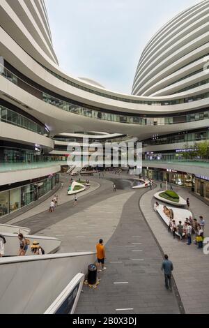Galaxy SOHO urban complex building by Zaha Hadid, Beijing, China Stock ...