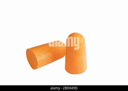Orange color ear plugs isolated on white background Stock Photo - Alamy
