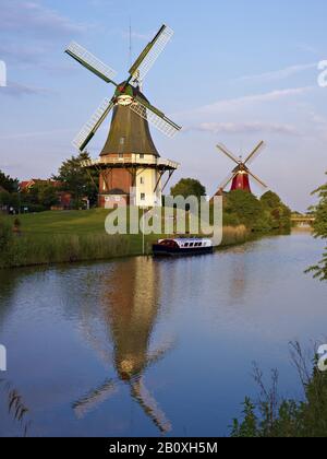 Windmills, Greetsiel, East Frisia, Lower Saxony, Germany, Europe Stock ...