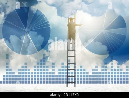 Businessman drawing charts in the sky Stock Photo - Alamy