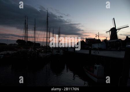 Sky and channel in sunset of Zeeland travel Stock Photo - Alamy