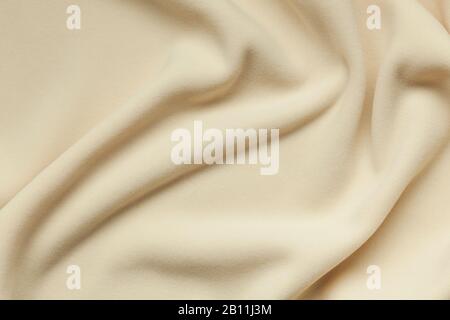 Soft wavy beige blanket as background Stock Photo - Alamy